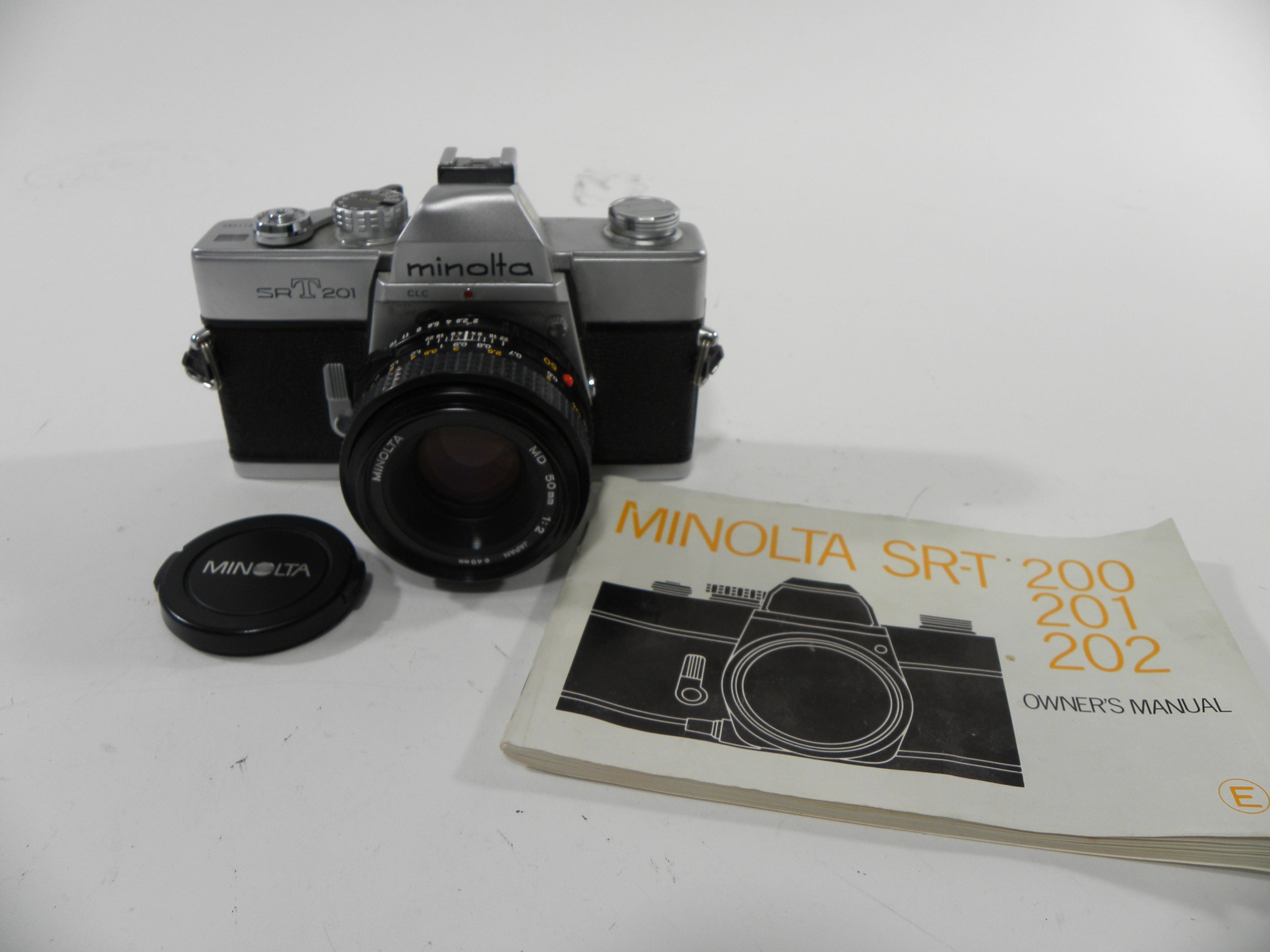 Minolta SRT-201 35mm SLR w/MD 50mm f2 – Camera Exchange