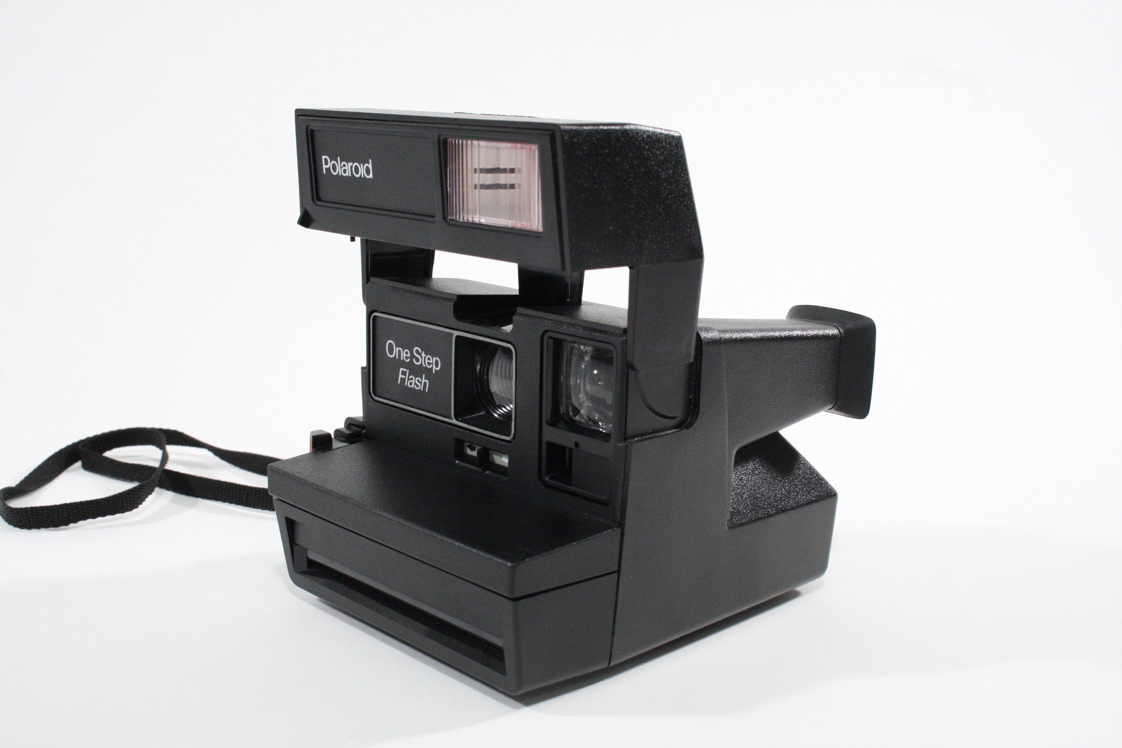 Polaroid One Step Flash – Camera Exchange
