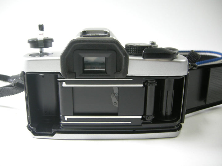 Promaster 2500 PK Super 35mm SLR camera w/MC 50mm f1.7 – Camera Exchange