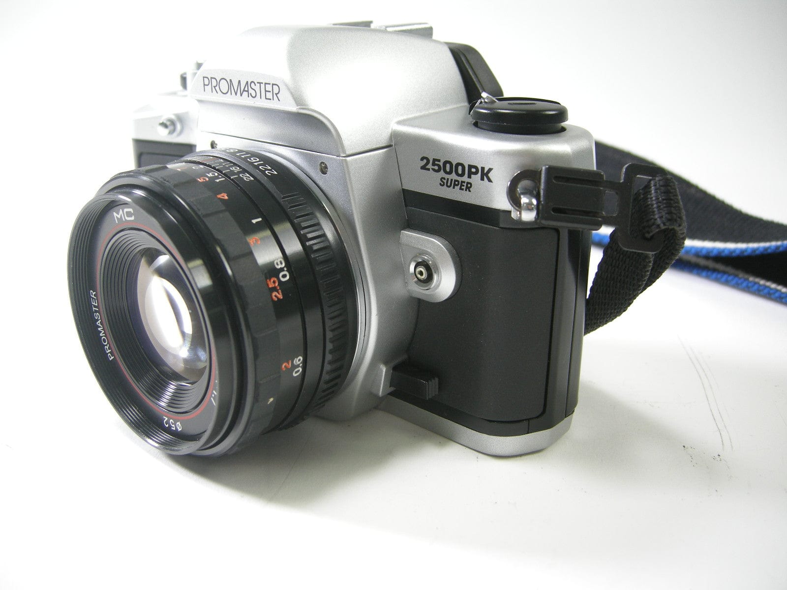 Promaster 2500 PK Super 35mm SLR camera w/MC 50mm f1.7 – Camera Exchange