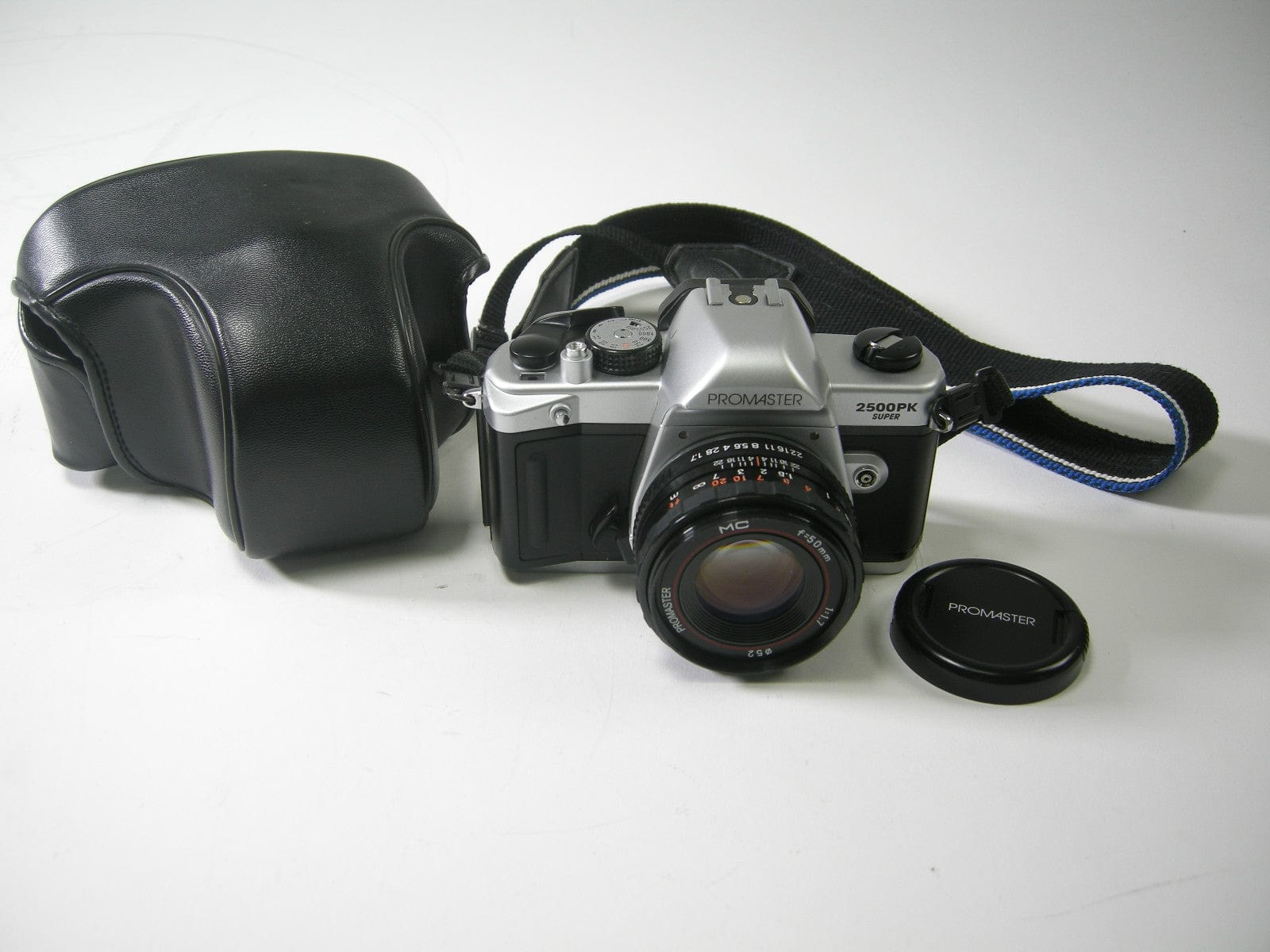 Promaster 2500 PK Super 35mm SLR camera w/MC 50mm f1.7 – Camera Exchange